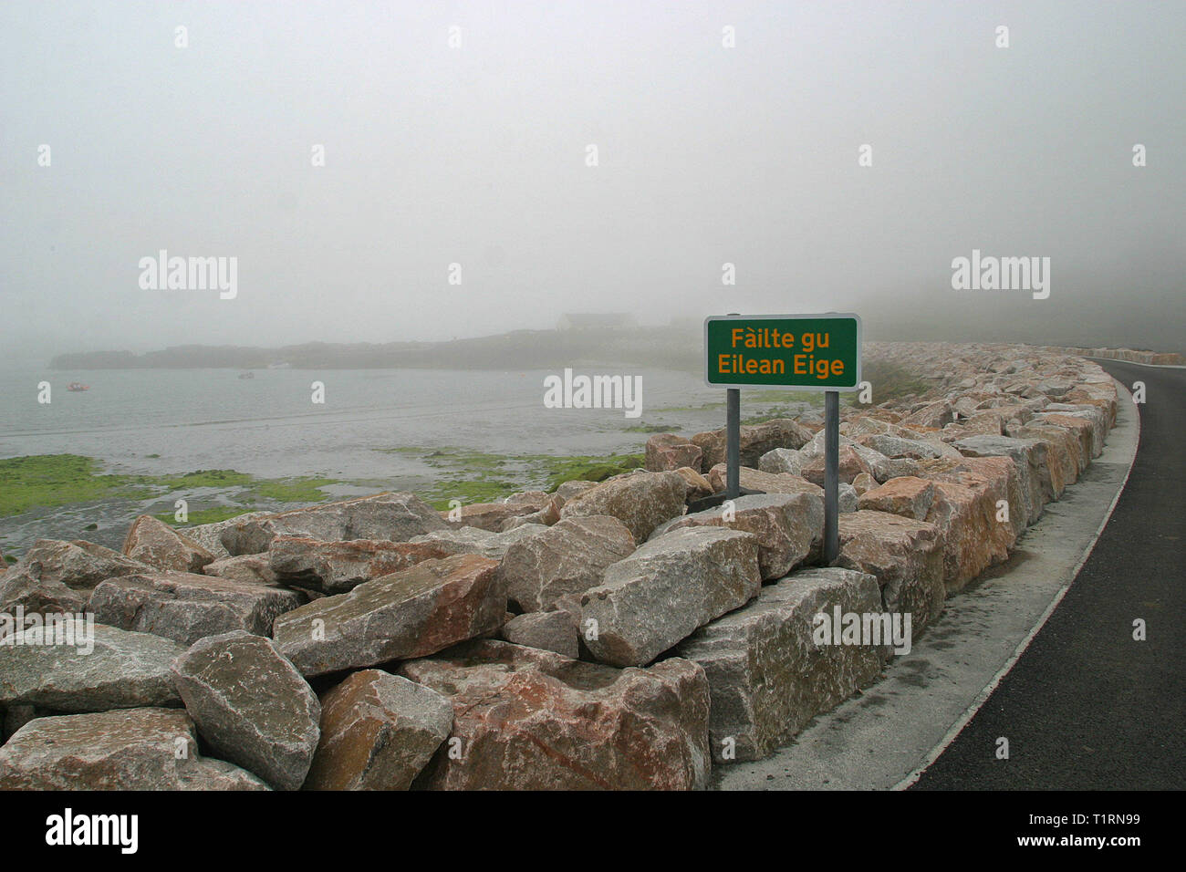 Summer mist envelopes Galmisdale Bay on the Hebridean island of Eigg on ...