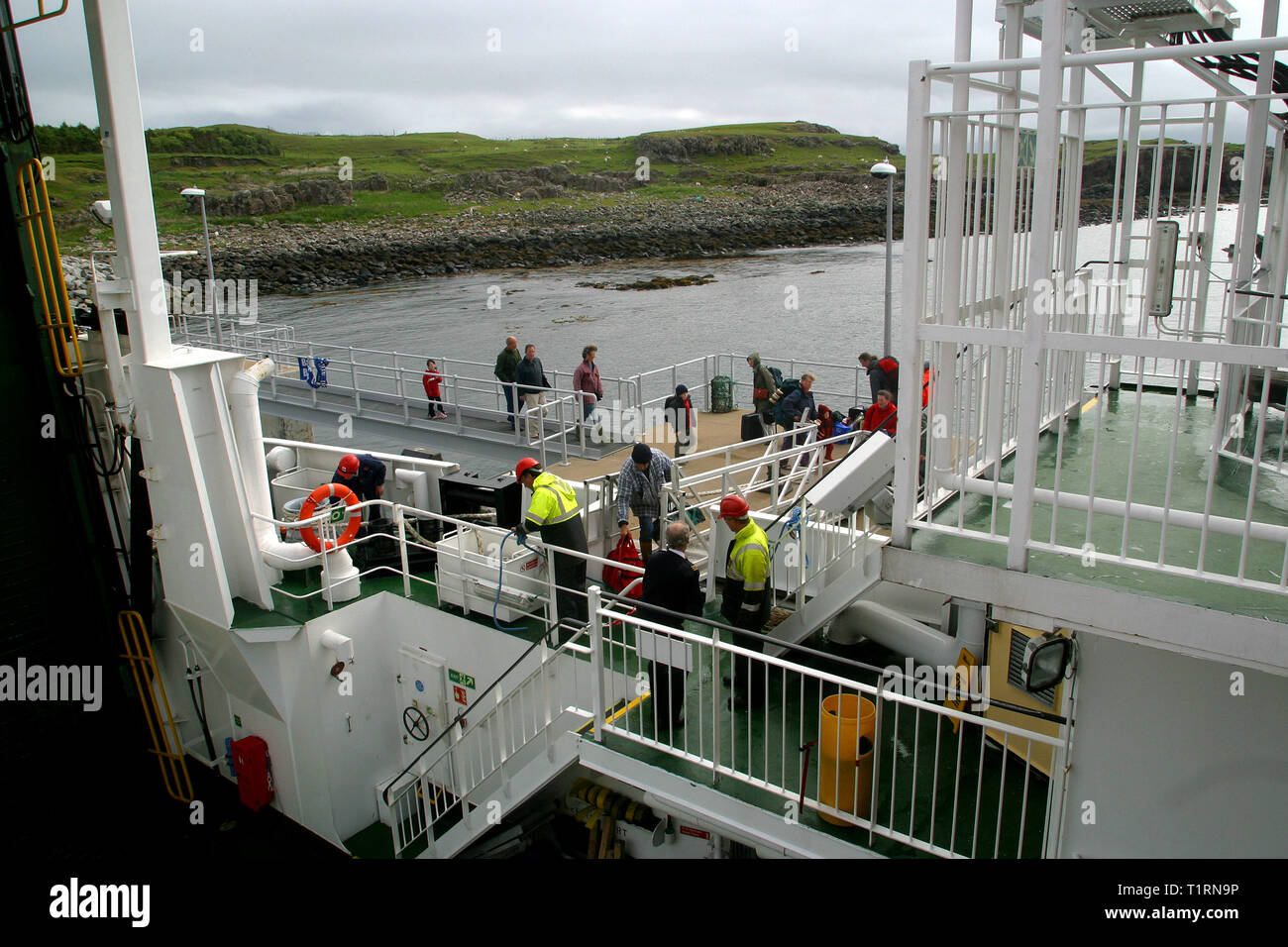 Passengers boarding the Caledonian-MacBrayne roll-on roll-off ferry ...