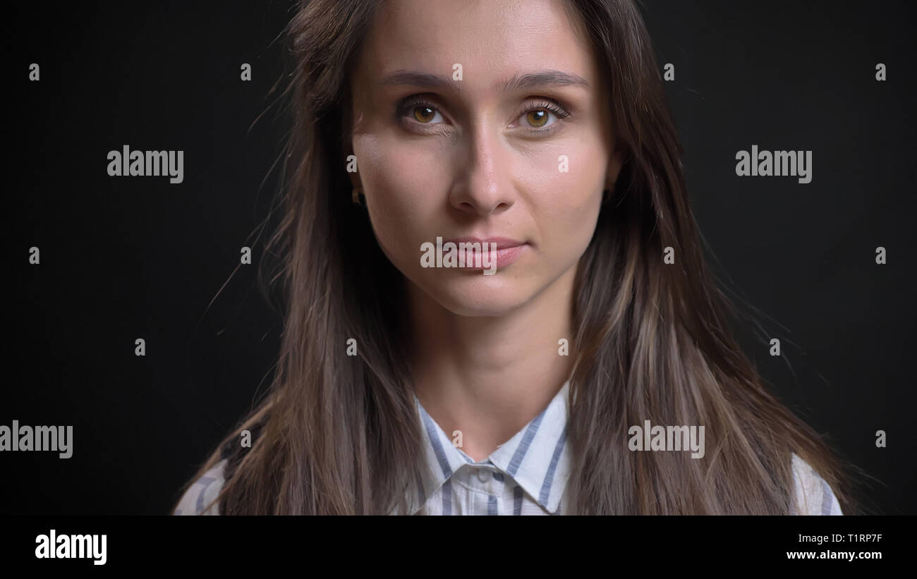 Woman face closeup serious hi-res stock photography and images - Alamy
