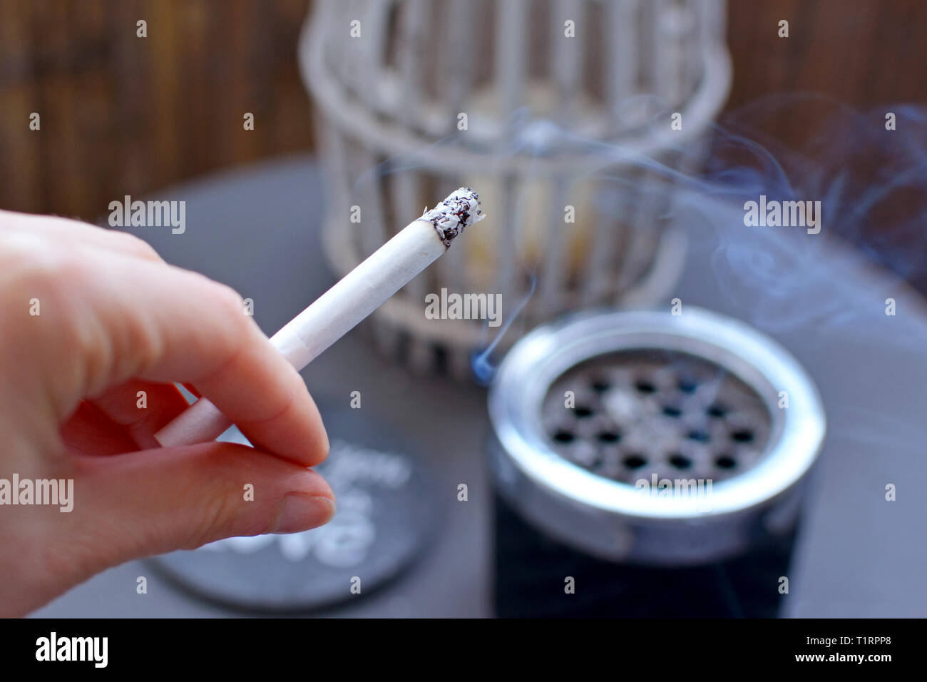Lit Cigarette Woman Hand Smoke High Resolution Stock Photography and ...