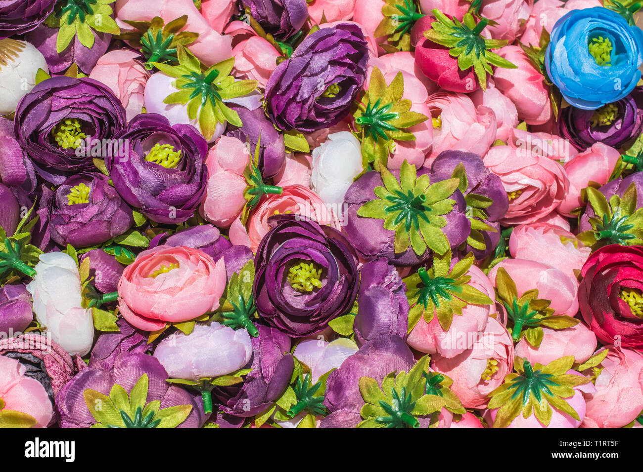Floral art made of colorful artificial flowers in view Stock Photo - Alamy