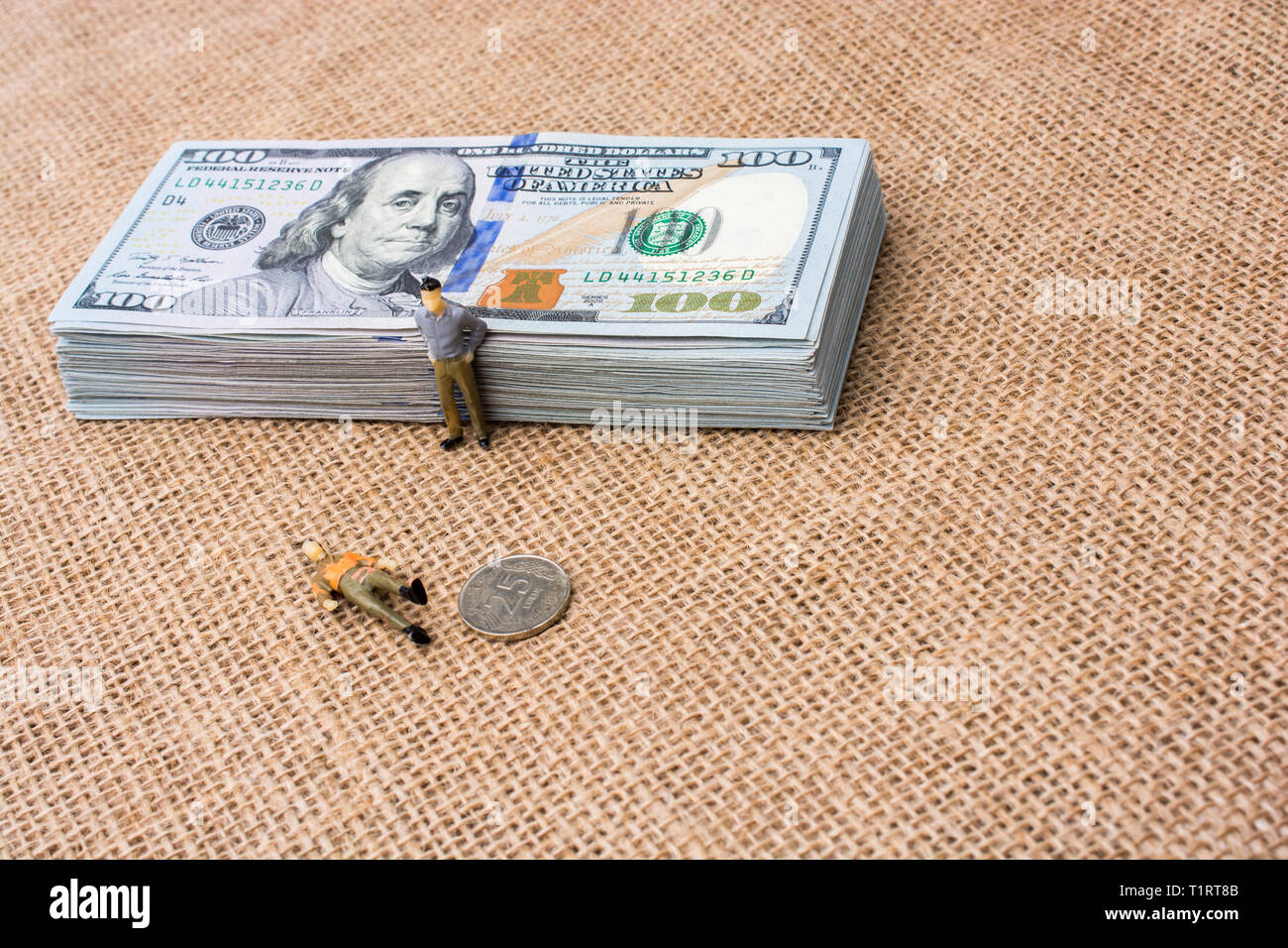 Money stack figurines hi-res stock photography and images - Alamy