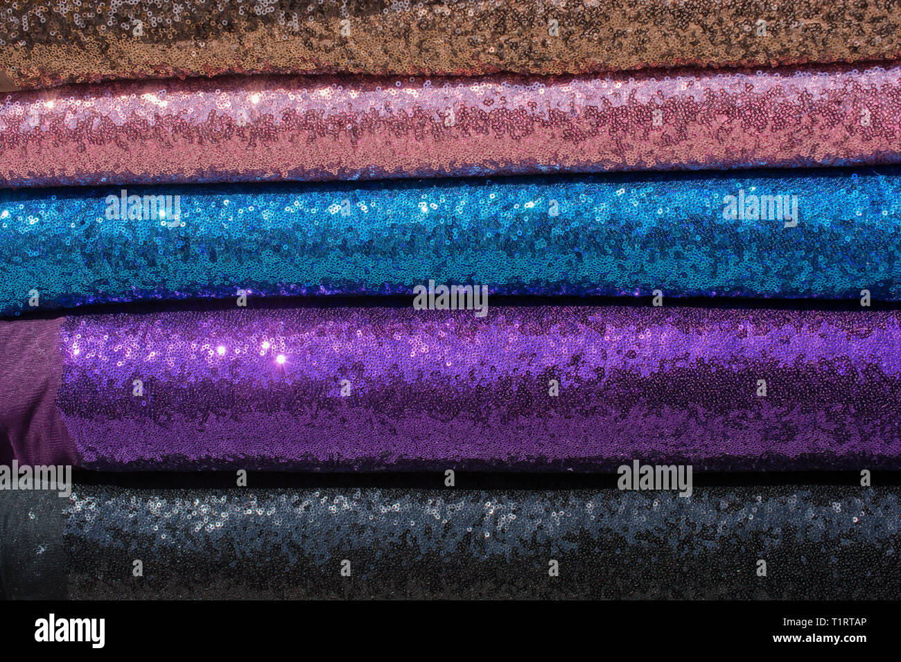 Examples of bright fabric of various color in view Stock Photo - Alamy