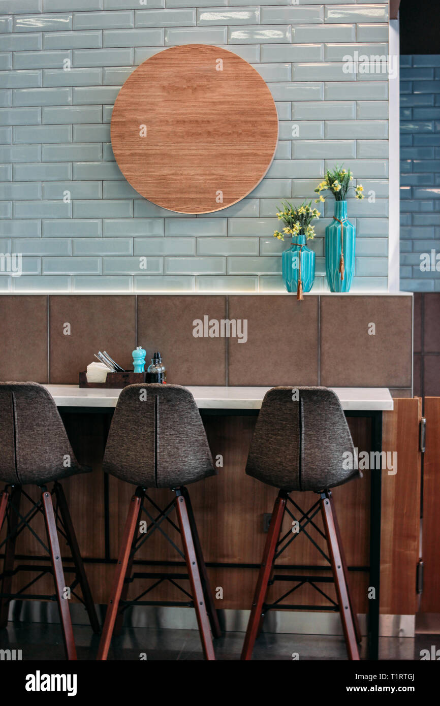 Modern light blue interior of the cafe Stock Photo - Alamy