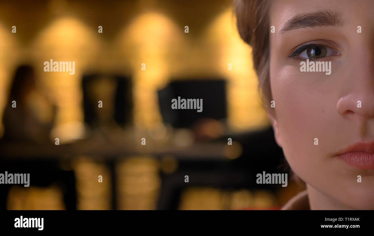 Closeup half-face shoot of young attractive caucasian female face with ...