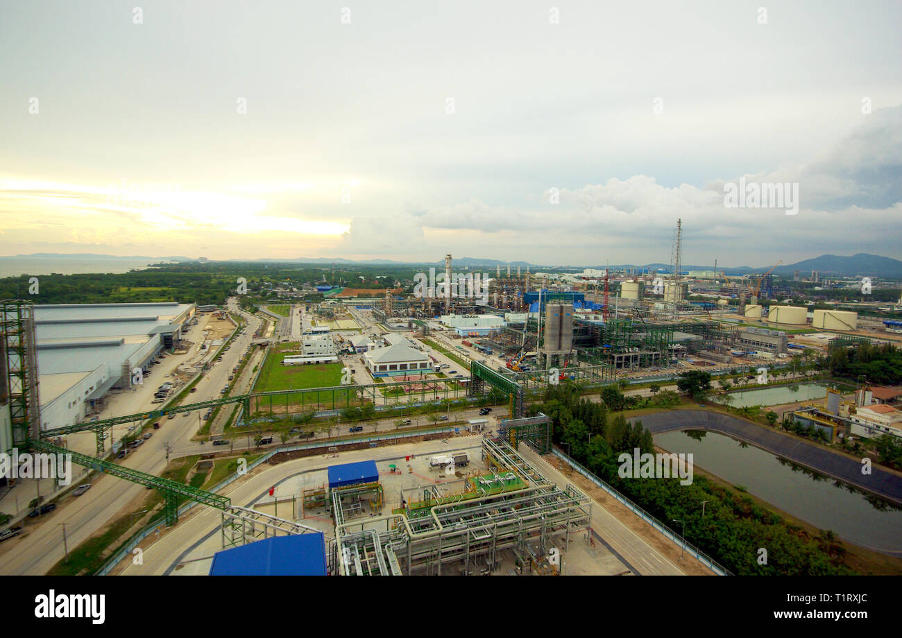 Wideview of under construction Large industrial mill in evening light ...
