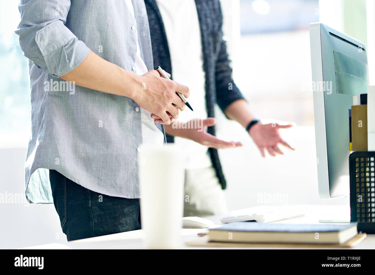 Working in front of computer hi-res stock photography and images - Alamy