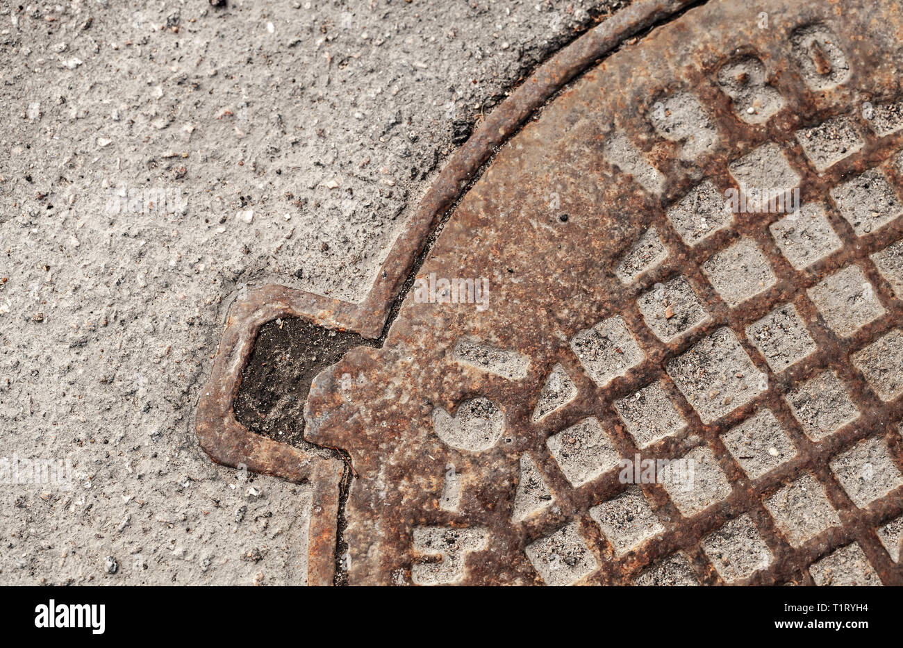Old round sewer manhole close-up abstract fragment Stock Photo - Alamy
