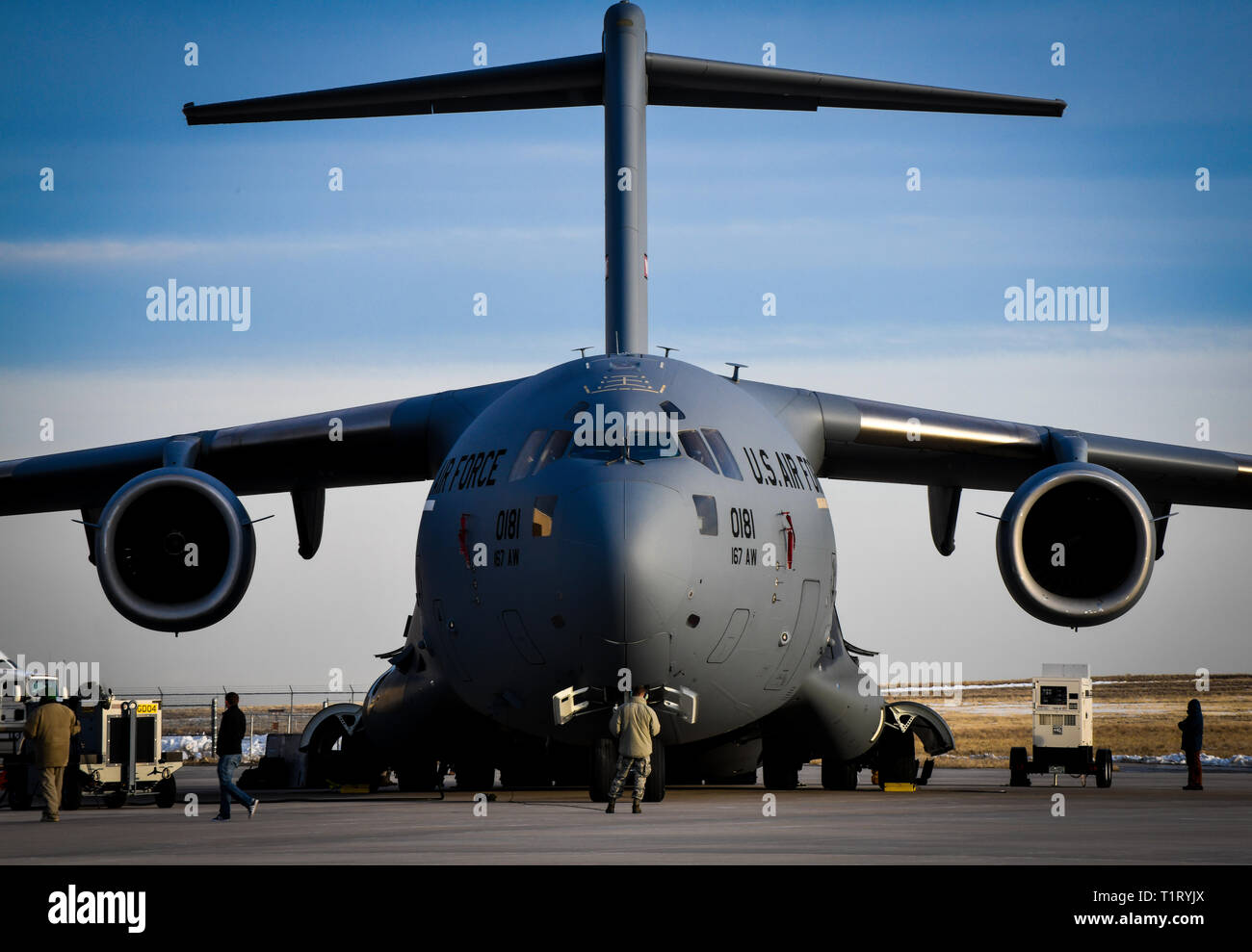 A C-17 Globemaster III sits on a flightline March 19, 2018, on Buckley ...