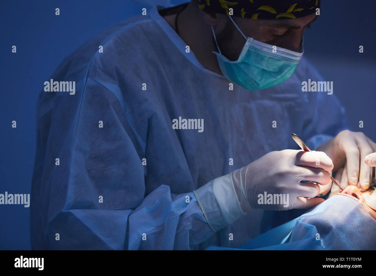 Female nurse adjusting oxygen mask hi-res stock photography and images ...