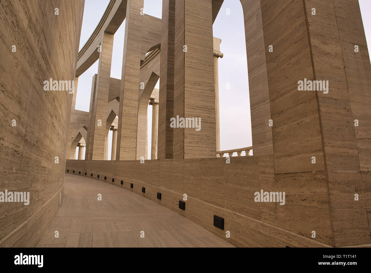 DOHA, QATAR – AUGUST 9, 2013: Solid concrete wall of amphitheater in ...