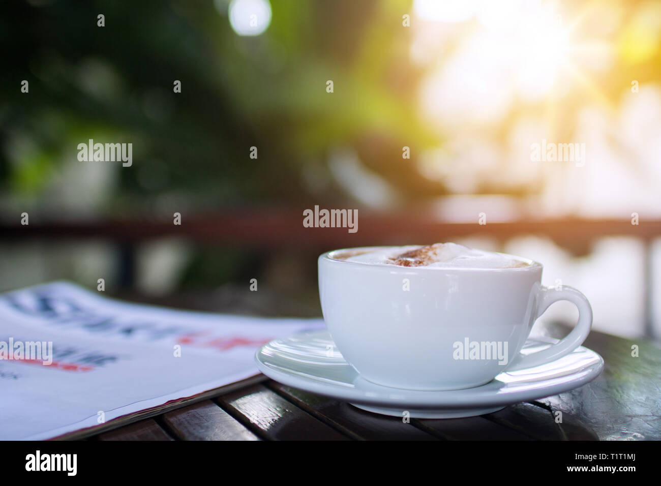 Cafe phone and newspaper hi-res stock photography and images - Alamy