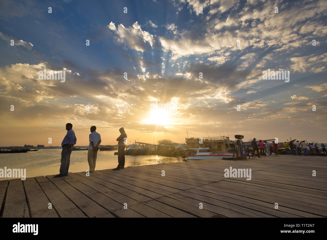 WAKRA, QATAR - FEBRUARY 28, 2014: People wacthing the sunset in Wakra ...