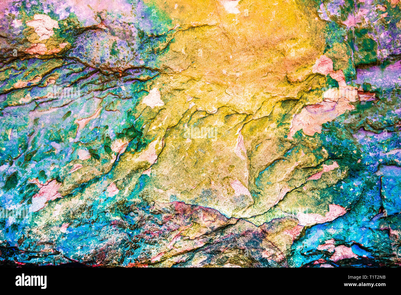 Orange, green, blue sediments and minerals, rock formations - a ...