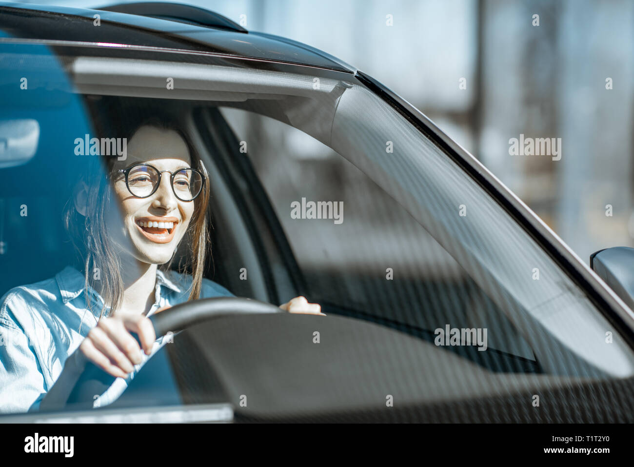 Smile woman happy blue car hi-res stock photography and images - Alamy
