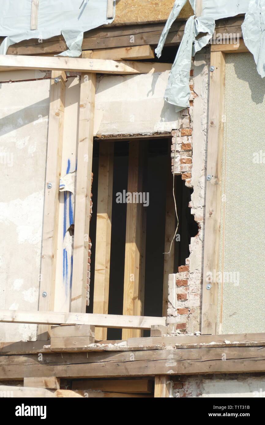 Door frame, house wall, demolition house Stock Photo - Alamy