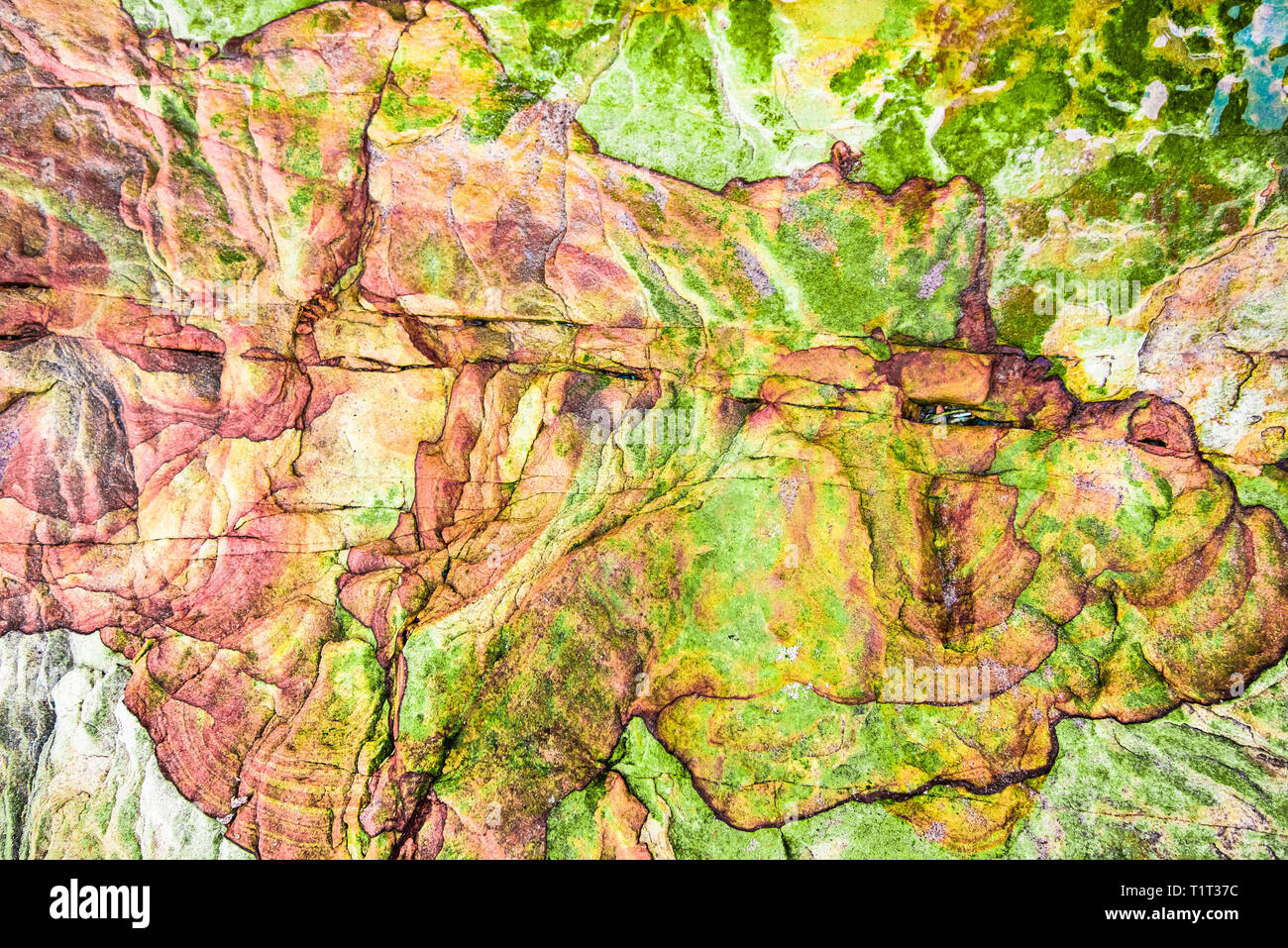 Green, red, orange sediments and minerals, rock formations - a colorful ...