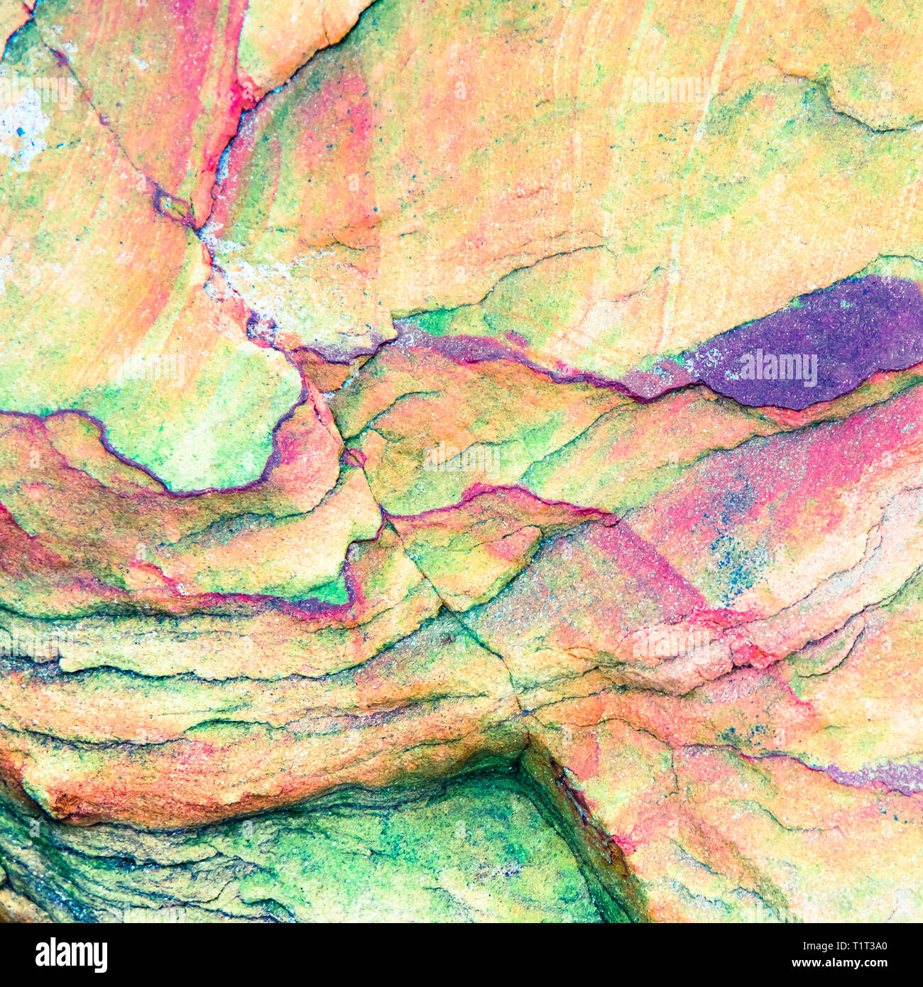 Orange, yellow, green, red sediments and minerals, rock formations - a ...