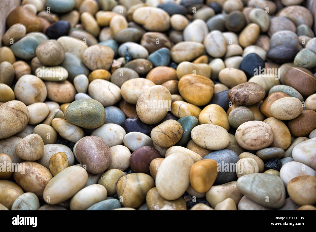Colorful stones with different sizes and shapes Stock Photo - Alamy