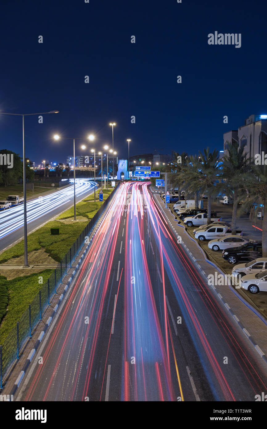 DOHA, QATAR - AUGUST 27, 2013: Capturing light-trails of fast moving ...