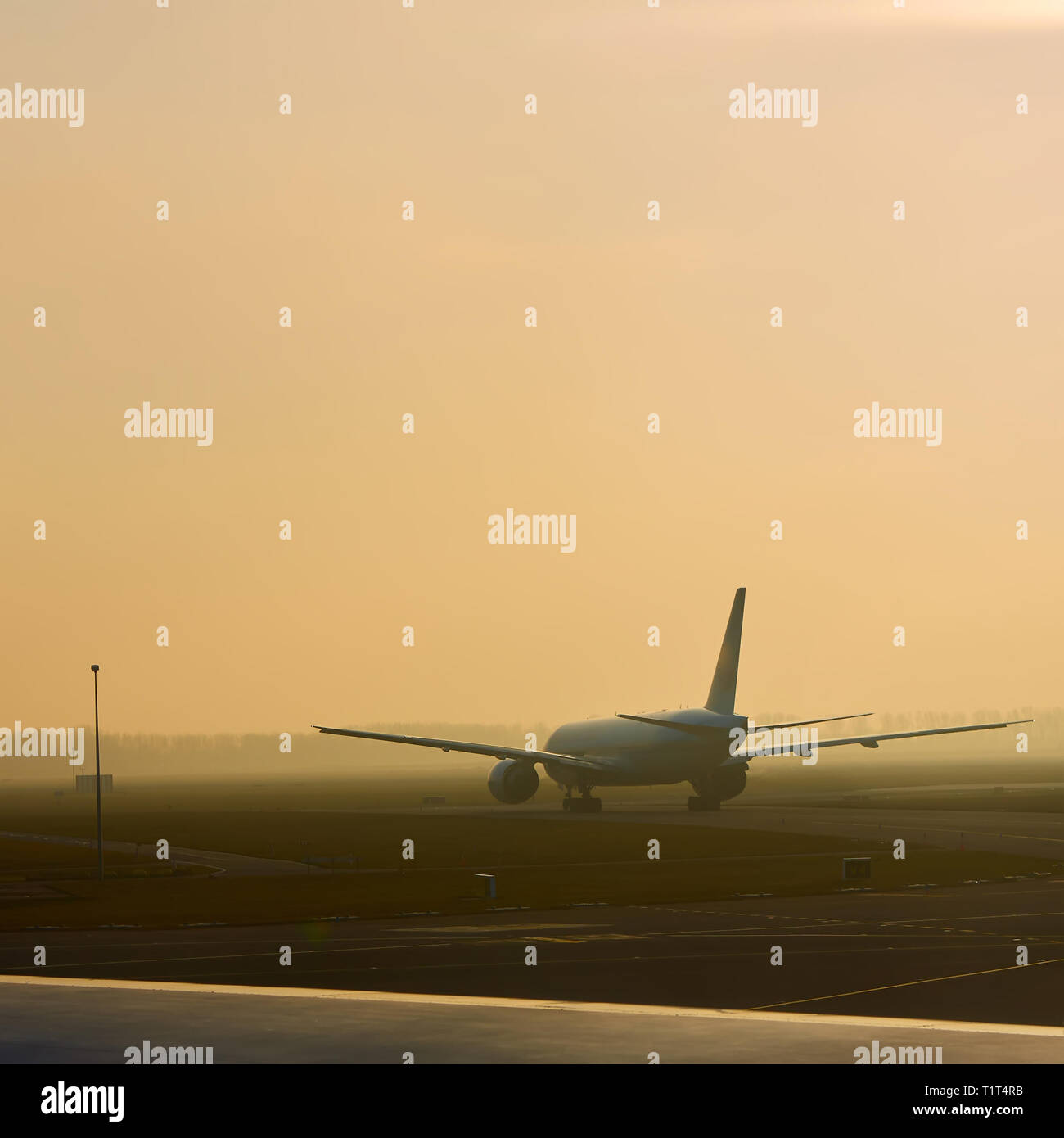 The takeoff plane in airport early morning Stock Photo - Alamy
