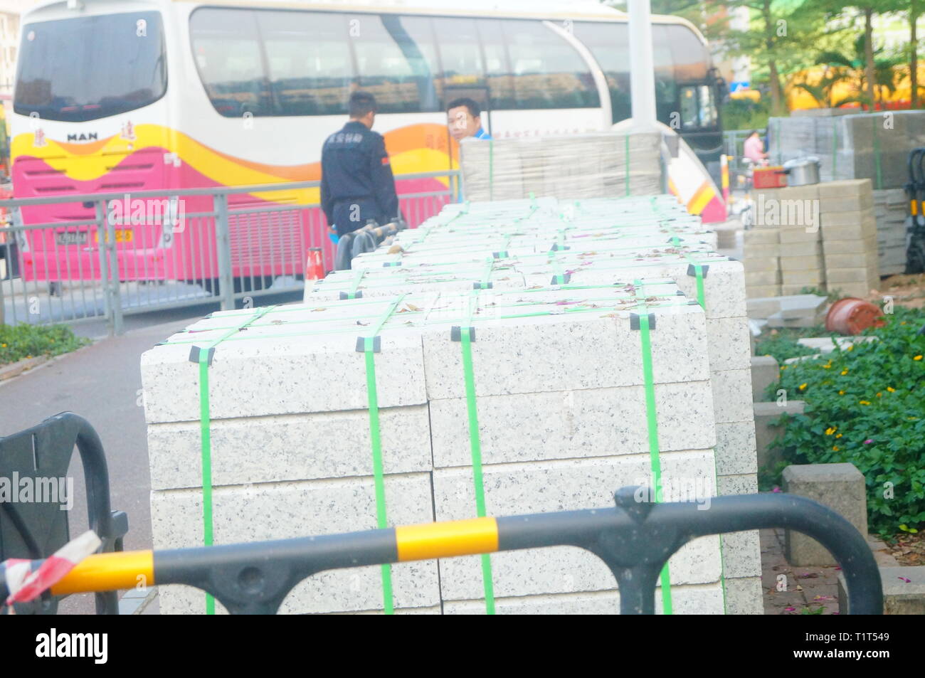 Shenzhen, China: Road construction site, stacked with building ...