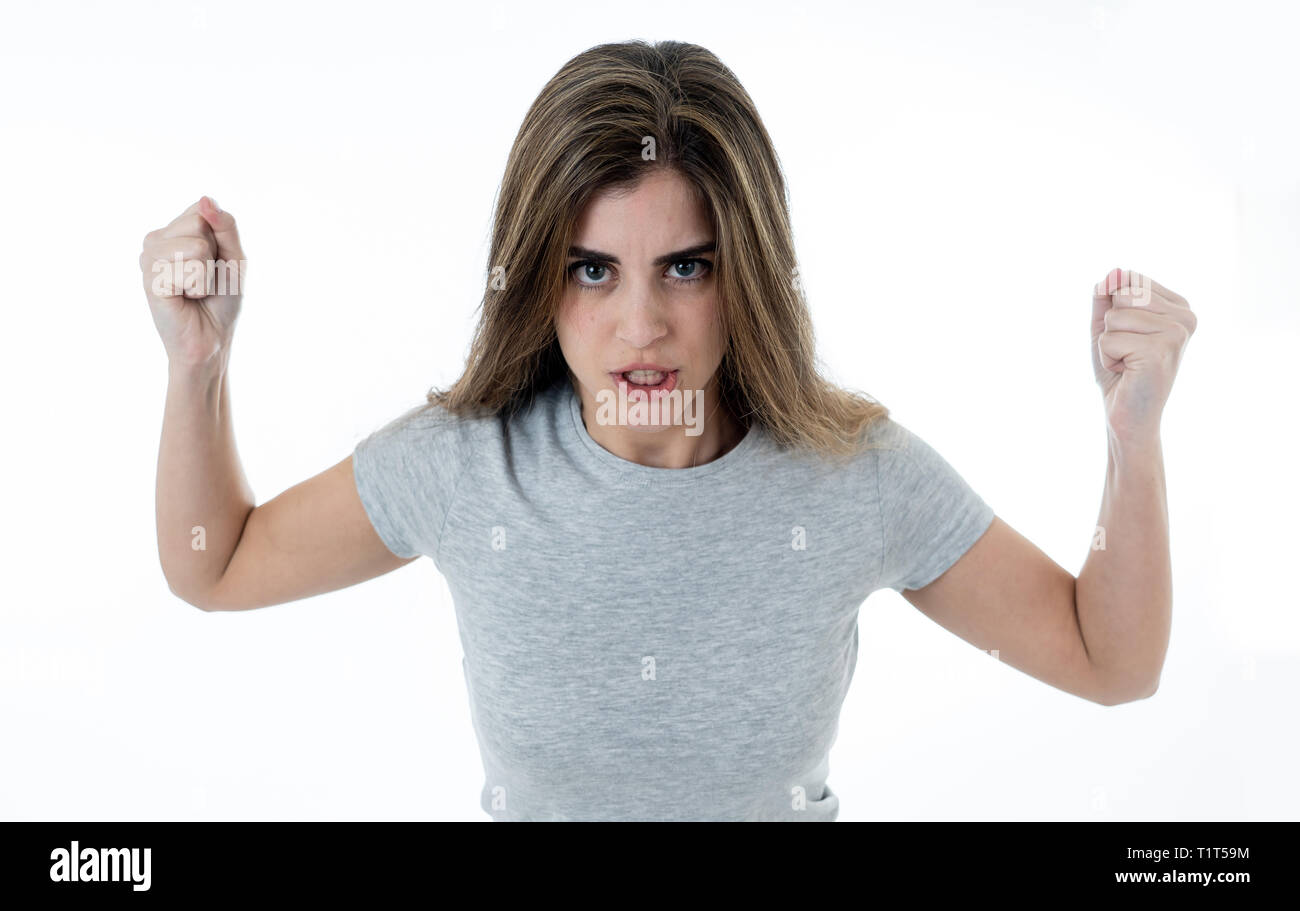 Close up of young attractive caucasian woman with an angry face ...