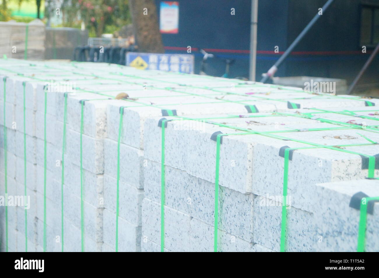 Shenzhen, China: Road construction site, stacked with building ...
