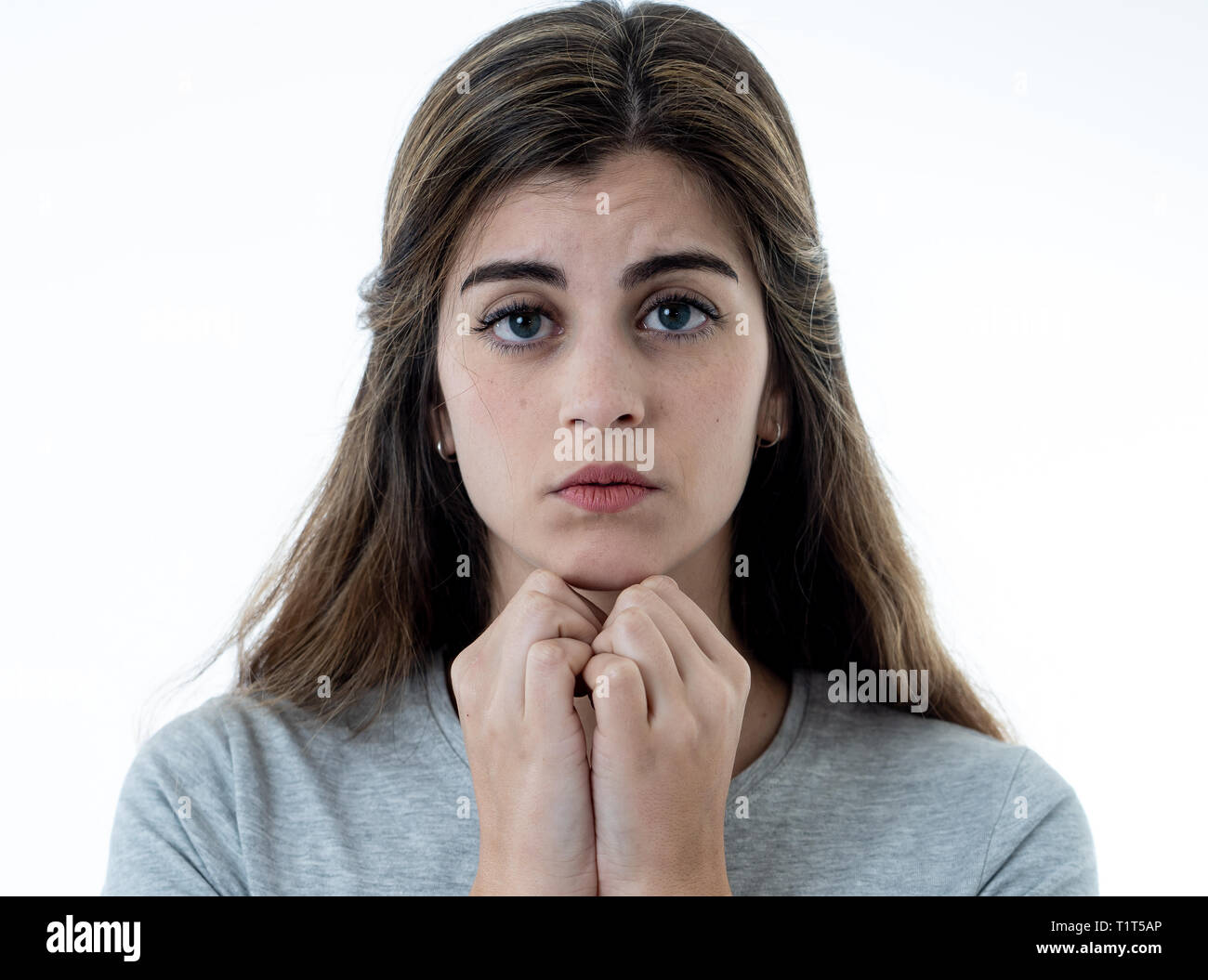 Portrait of young sad woman, serious and concerned crying and feeling ...