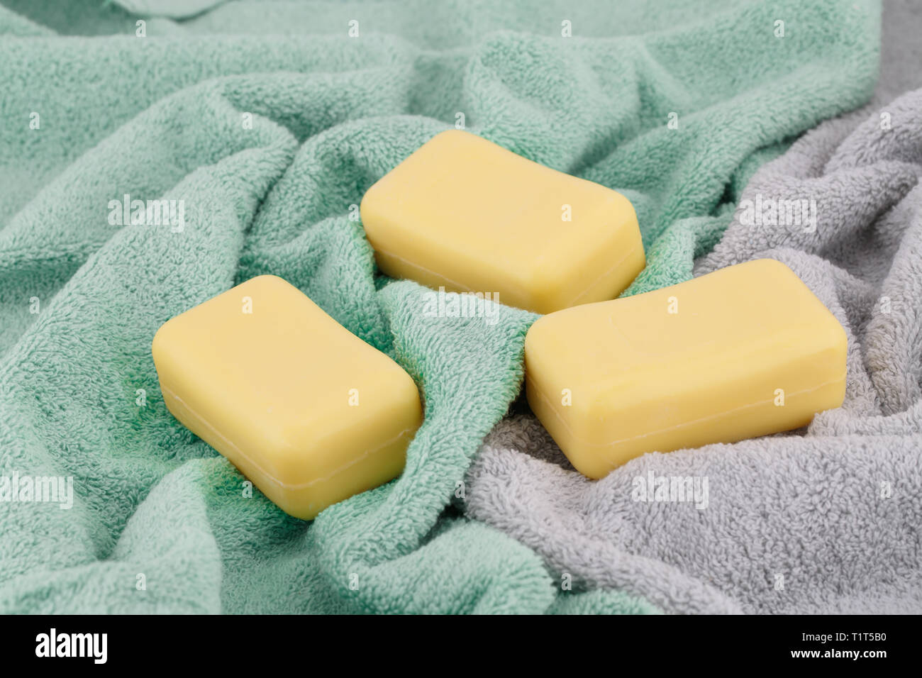 Colorful towels and soaps closeup picture Stock Photo - Alamy