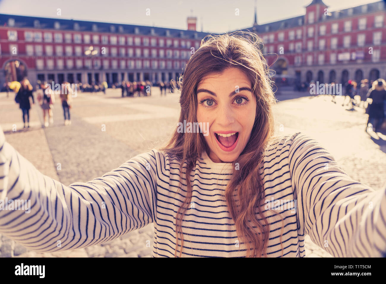 Beautiful student tourist woman happy and excited taking close up ...