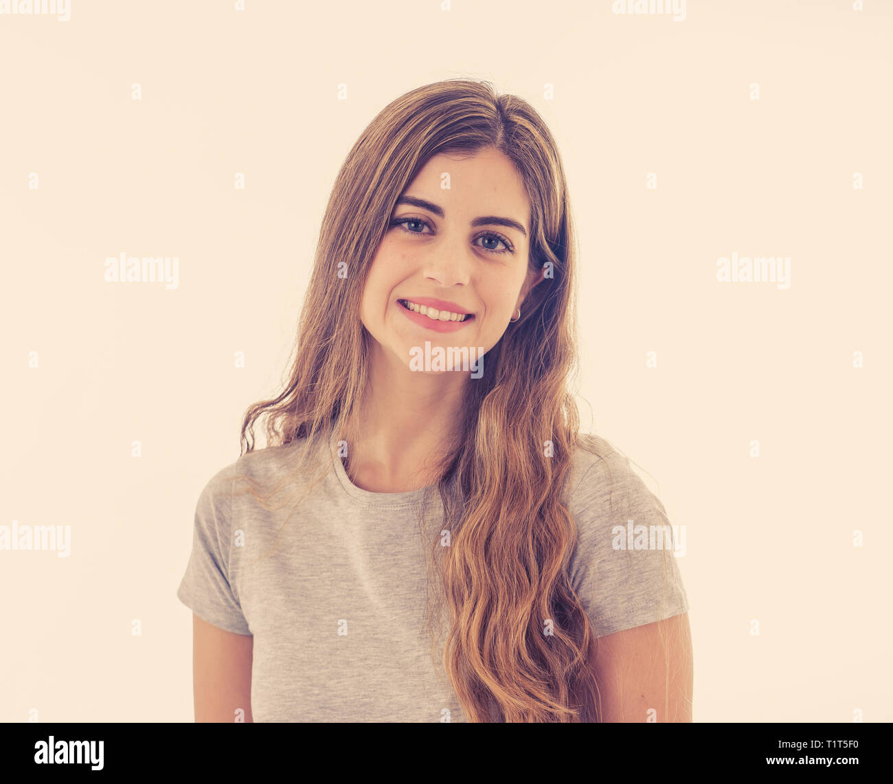 Portrait of a attractive and cheerful young teenager woman with happy ...