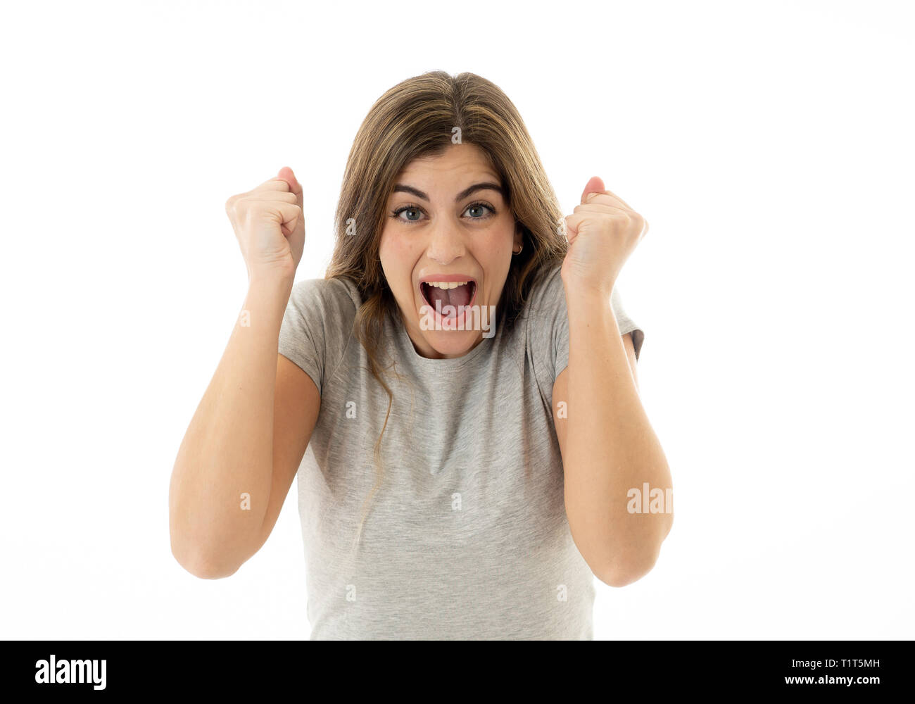 Portrait of beautiful shocked woman winning the lottery or having great ...