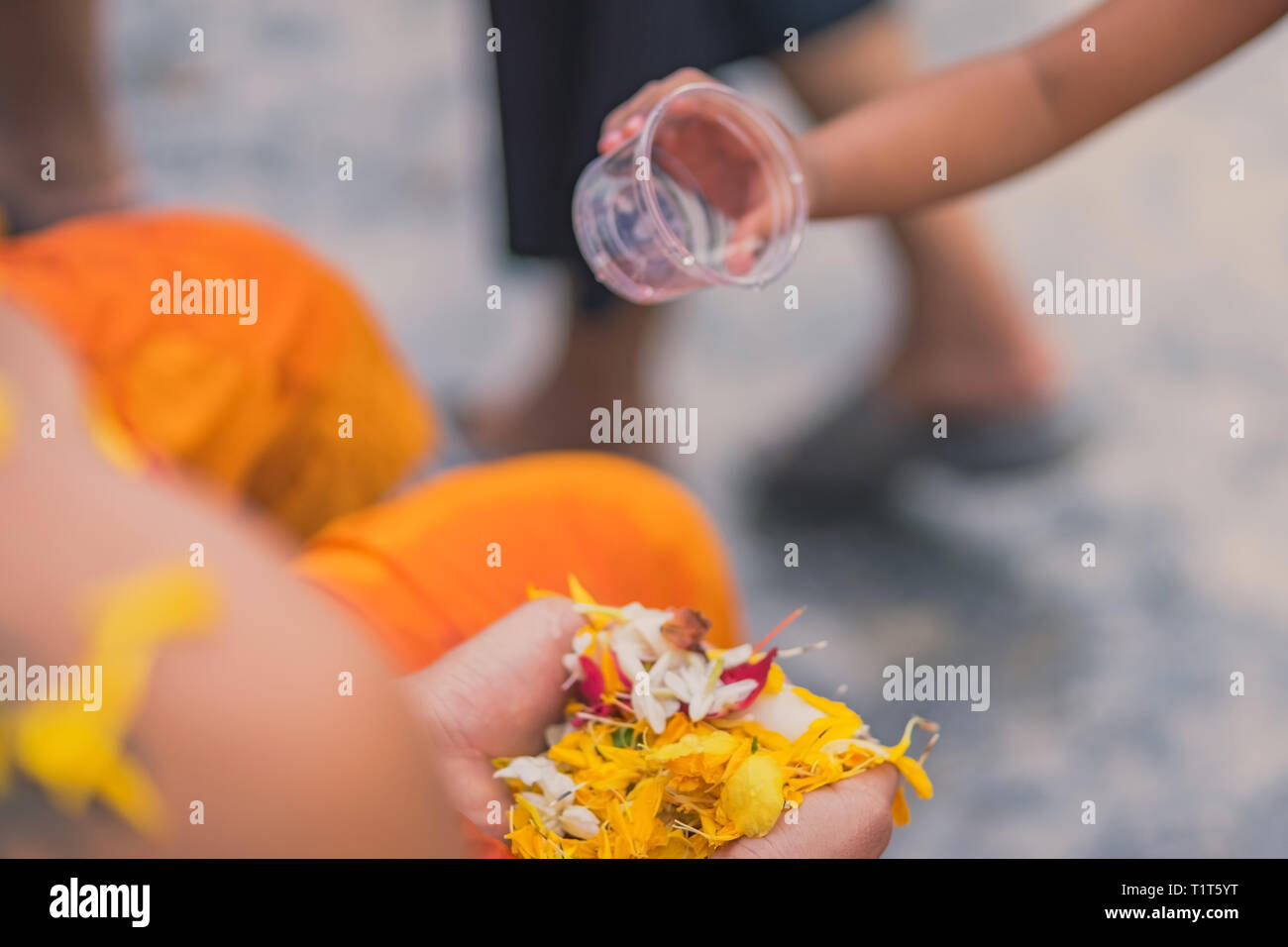 Hands pouring blessing water hi-res stock photography and images - Alamy