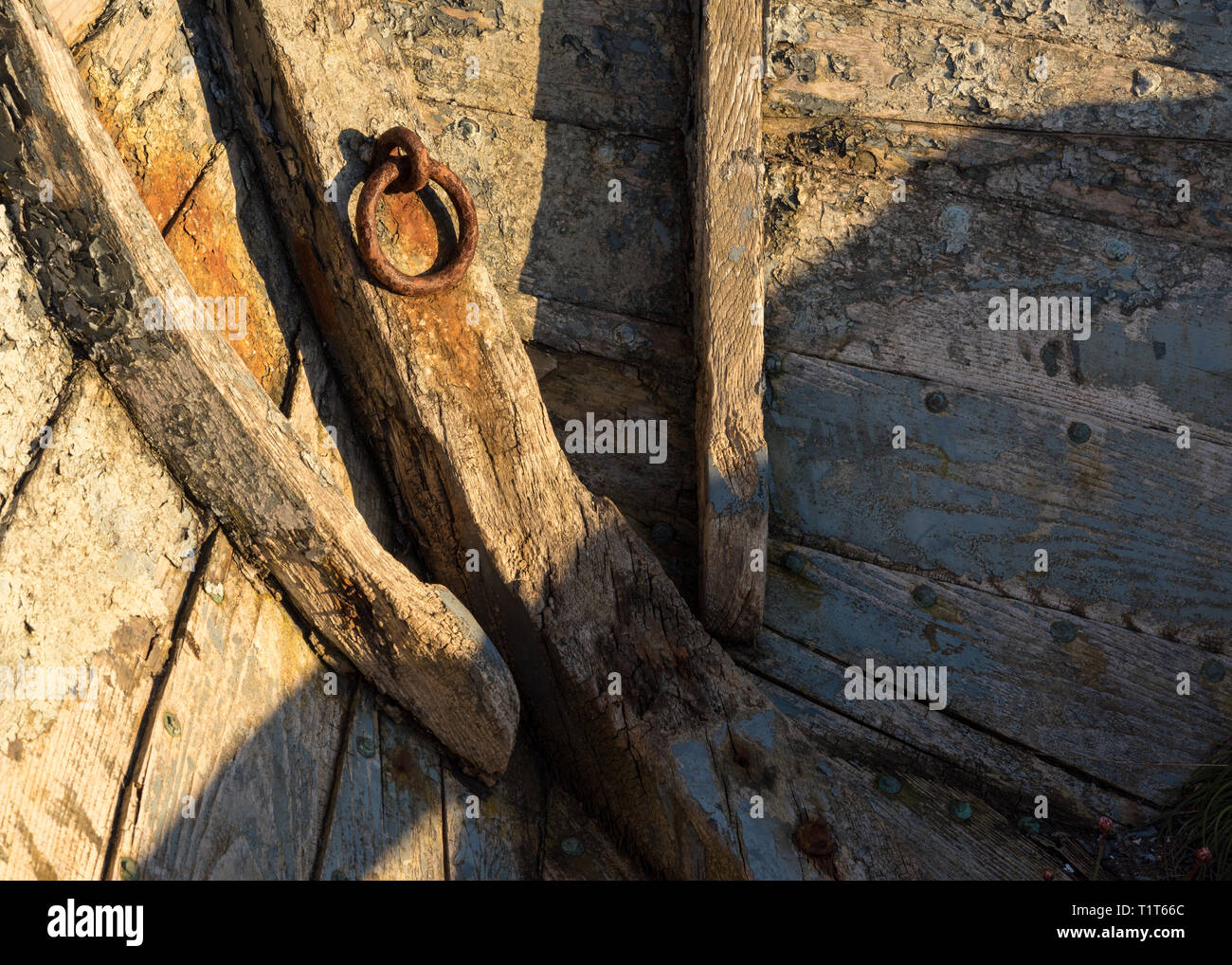 The inside of an old, abandoned and rusting fisherman's boat with the ...