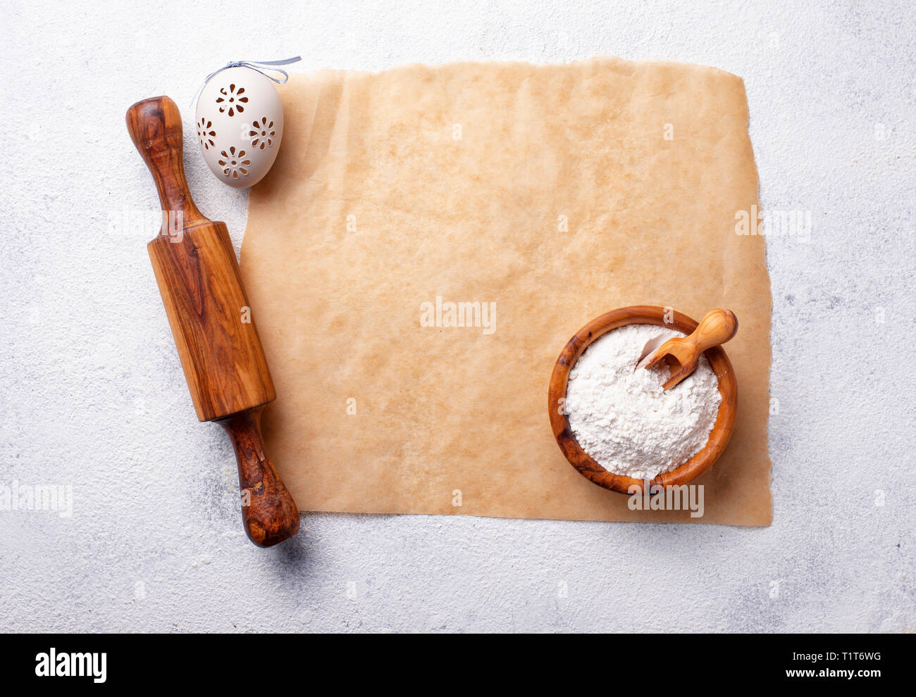 Baking concept. Rolling pin, flour and egg Stock Photo - Alamy