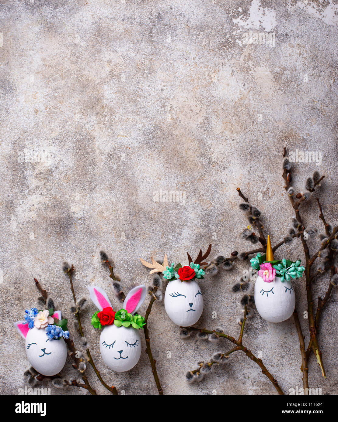 Easter eggs in shape of bunny, cat and deer Stock Photo - Alamy