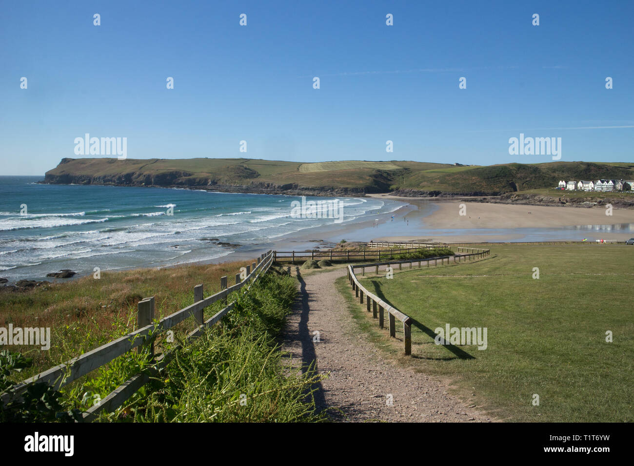 View of Polzeath Beach and Pentire Point from clifftop path. North ...