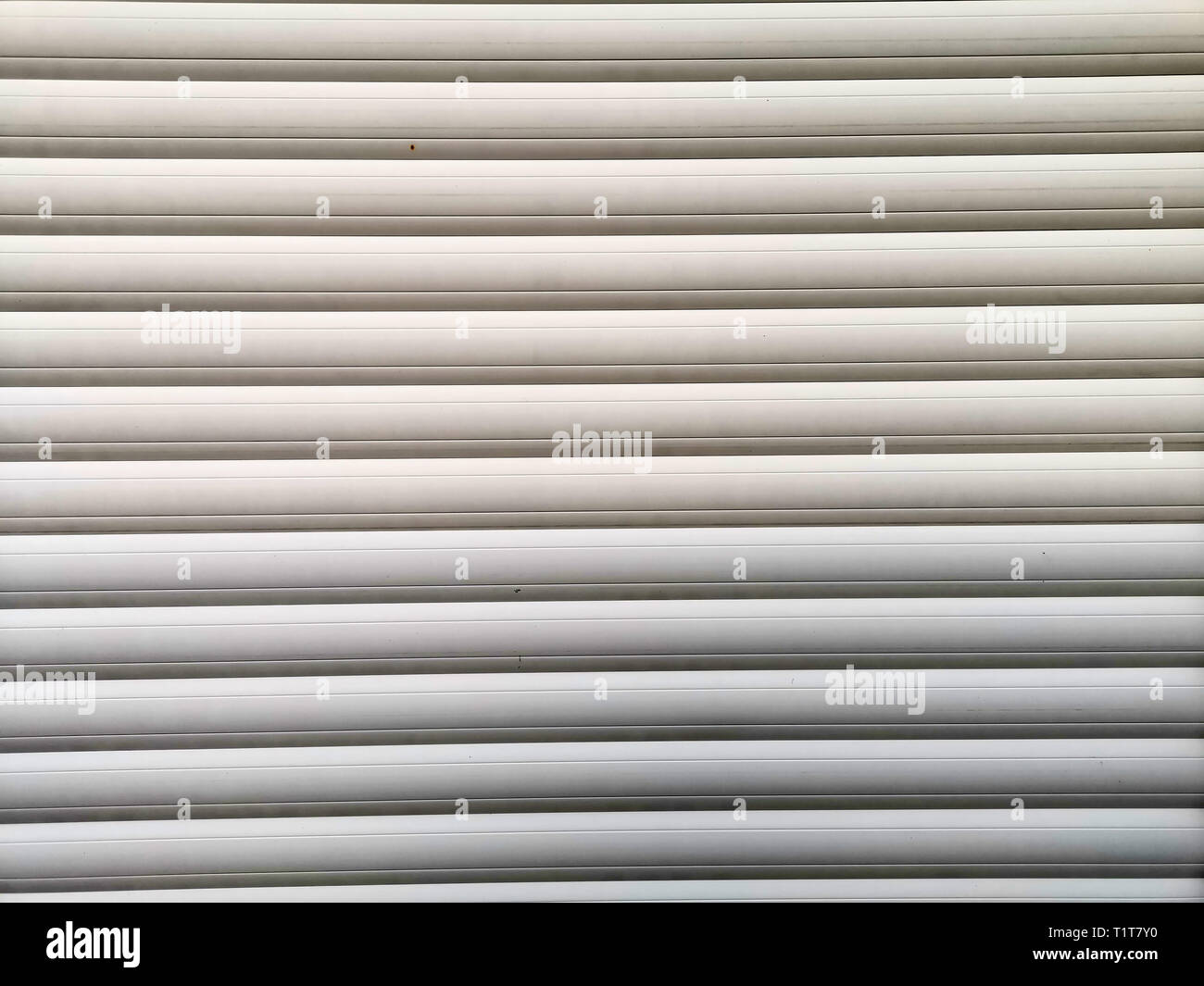 Metal Blinds with drawstring. Roller Shutter Background Stock Photo - Alamy