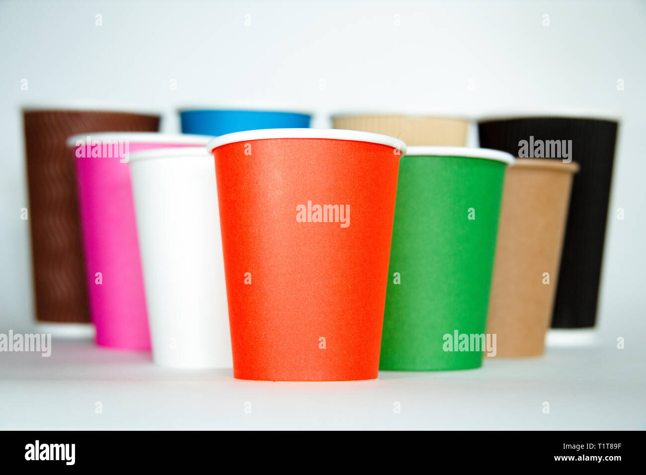 Different colored coffee cups isolated on a white background Stock ...