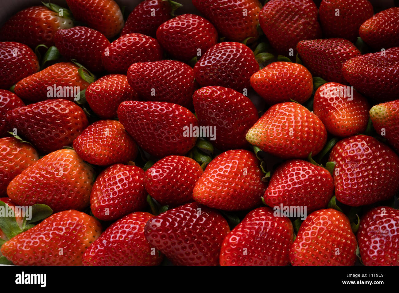 Background from freshly harvested strawberries Stock Photo - Alamy