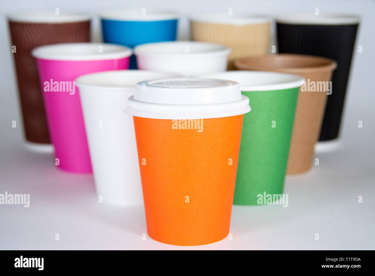 Different colored coffee cups isolated on a white background Stock ...