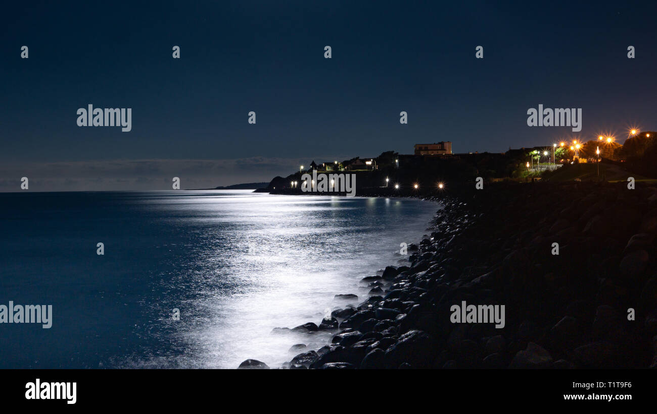 Moonlit water at foreshore Stock Photo - Alamy