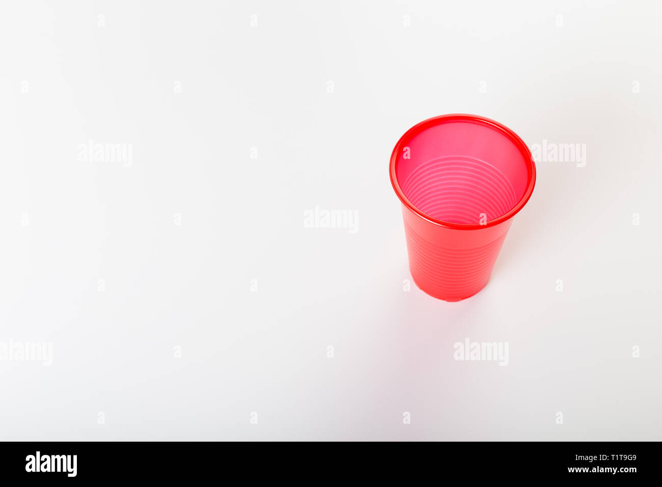 red disposable plastic glasses Stock Photo - Alamy