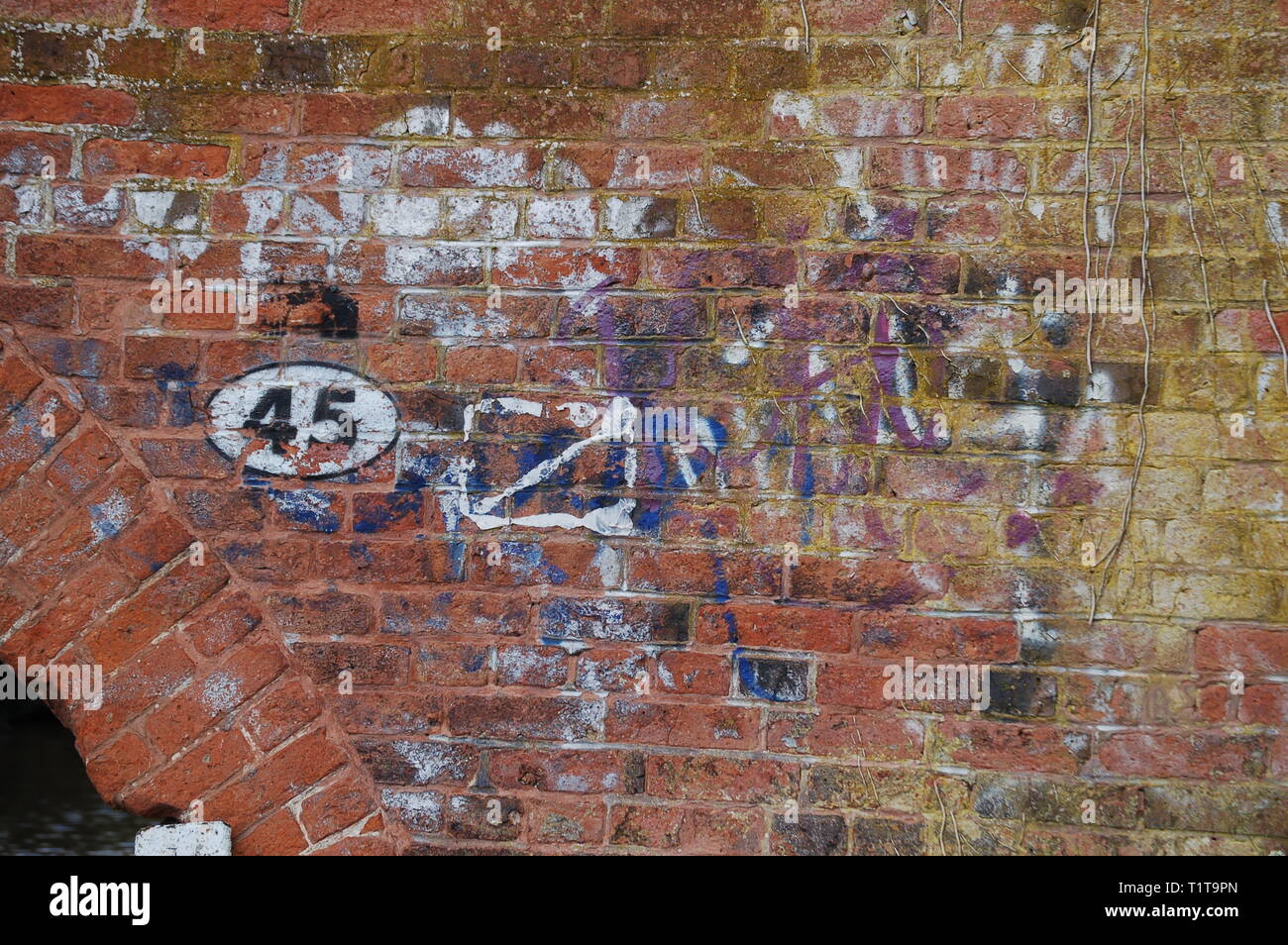 Red Brick Canal bridge number 45 with worn graffiti Stock Photo - Alamy