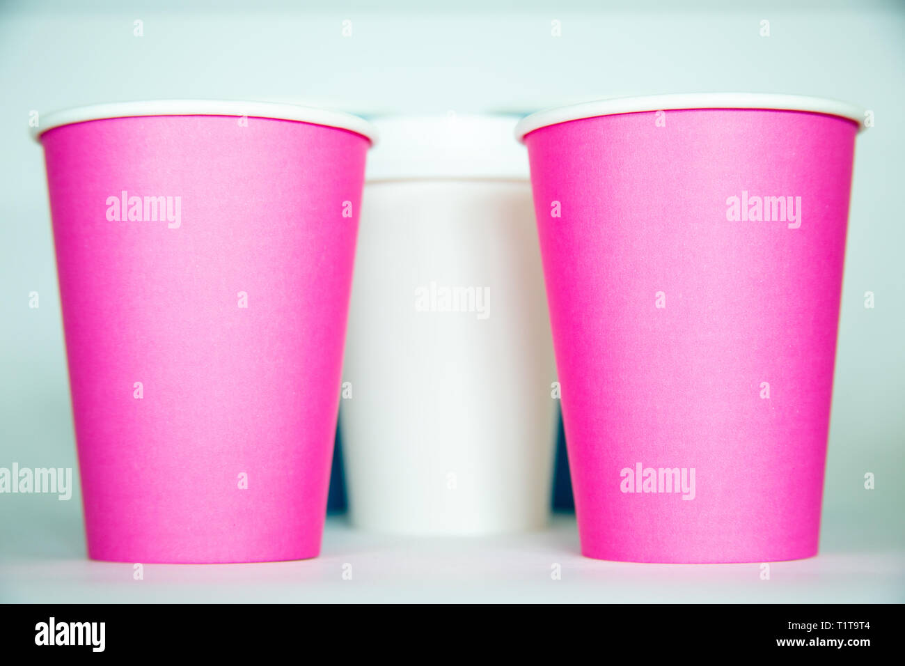 Different colored coffee cups isolated on a white background Stock ...