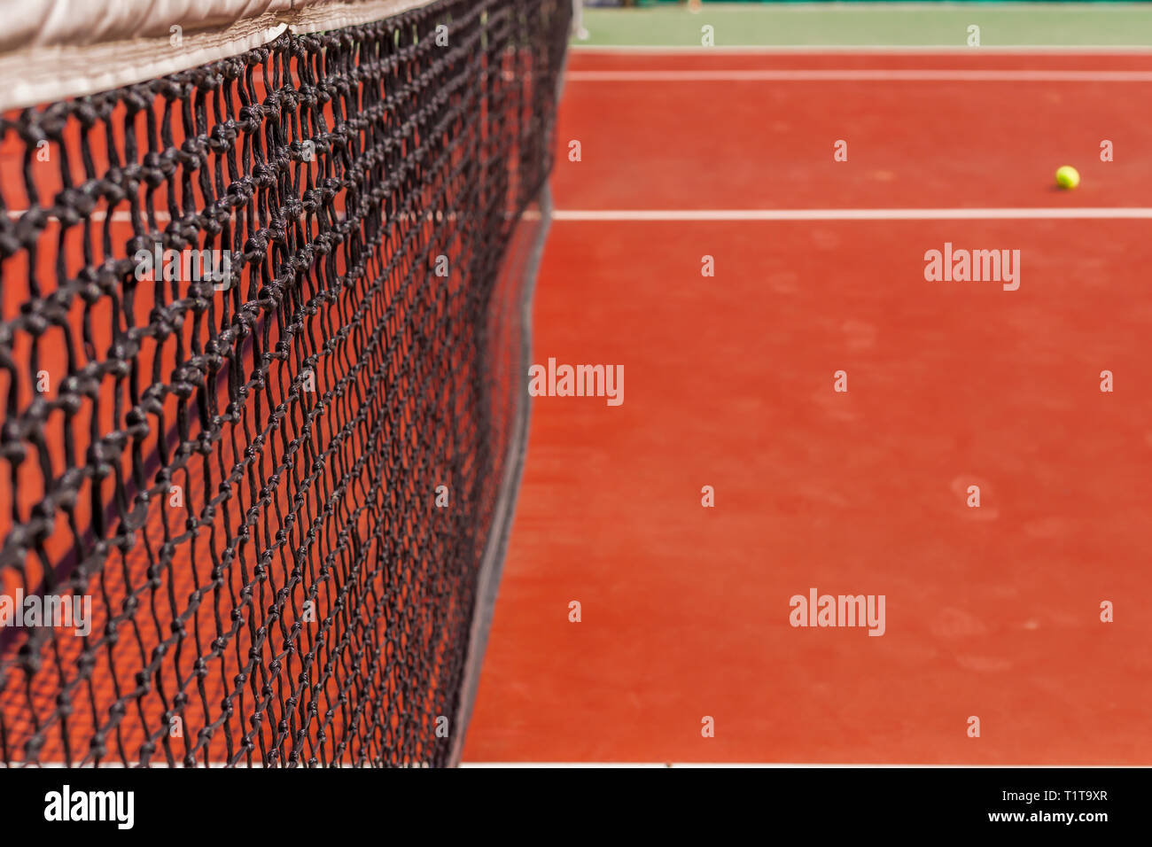 Tennis net on a tennis court background Stock Photo - Alamy