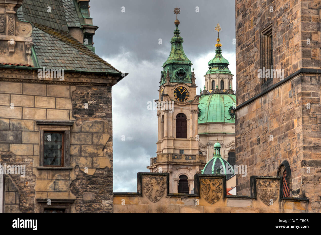 Dome and bell tower of a medieval castle from the ancient wall close up ...