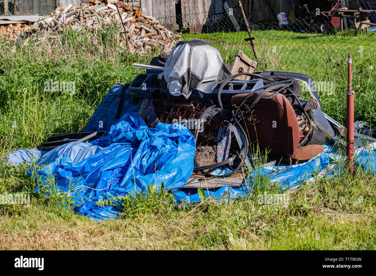 small garbage dump in the yard Stock Photo - Alamy