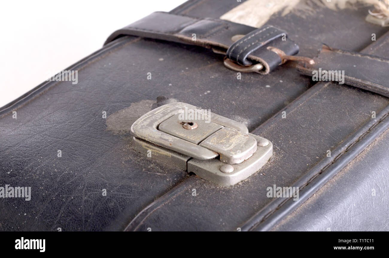 Old vintage hard suitcase with metal latch lock Stock Photo - Alamy